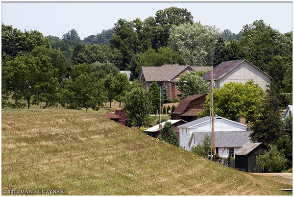 Construct an earthen levee - Reduce Flood Risk