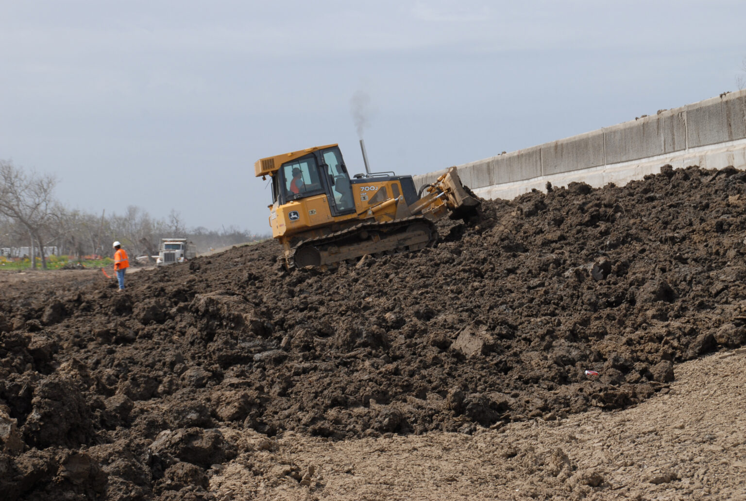 Construct an earthen levee - Reduce Flood Risk
